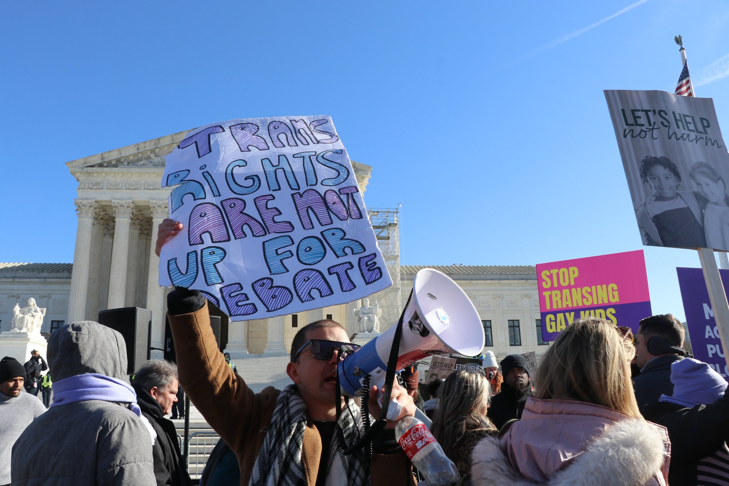 Hundreds protest outside Supreme Court as Justices hear case on ...